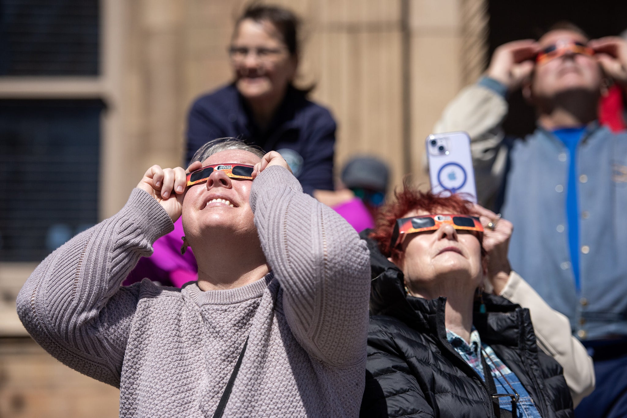 Wisconsinites find camaraderie during solar eclipse watch party - WPR