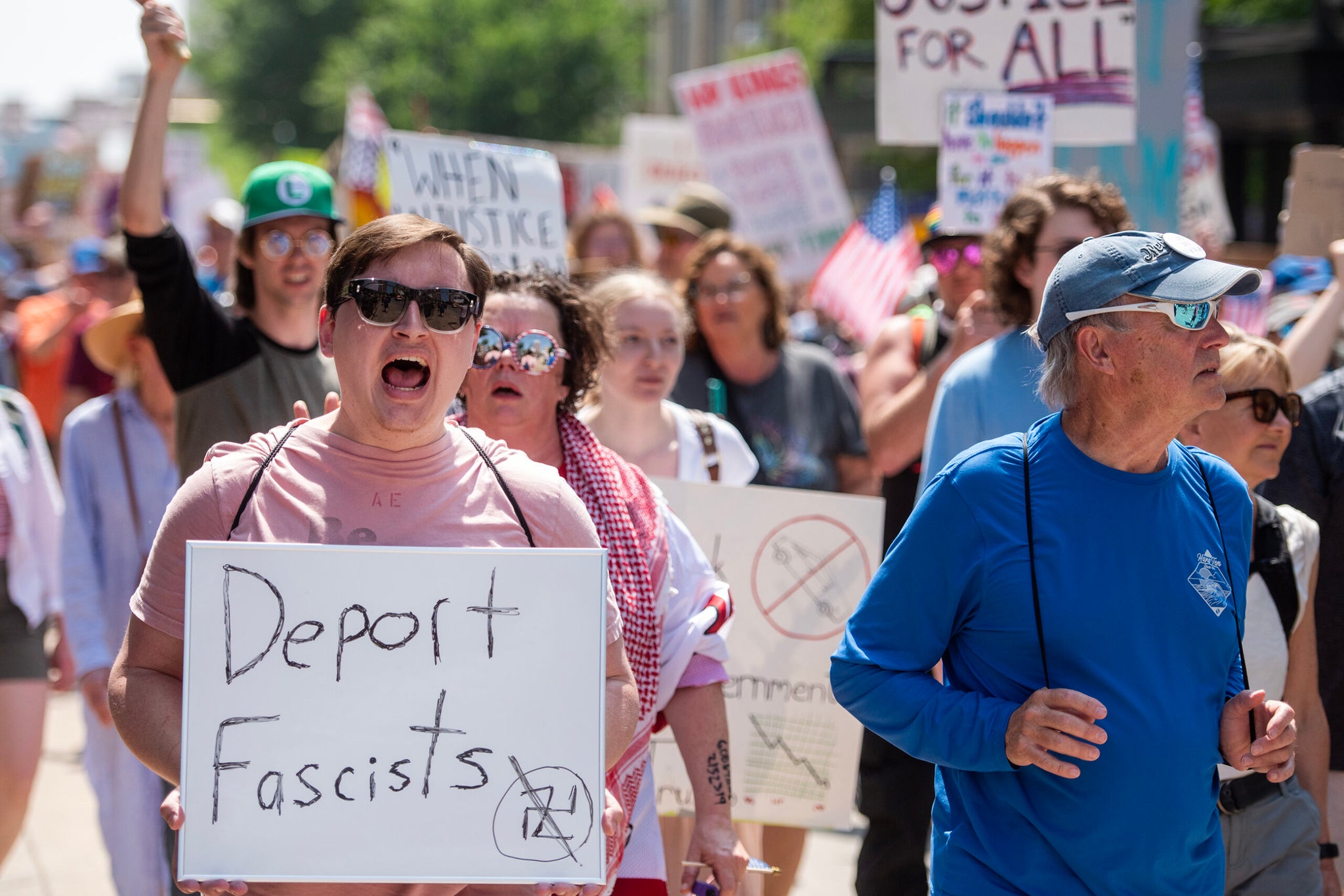 Protesters gather for 'No Kings' events across Wisconsin - WPR